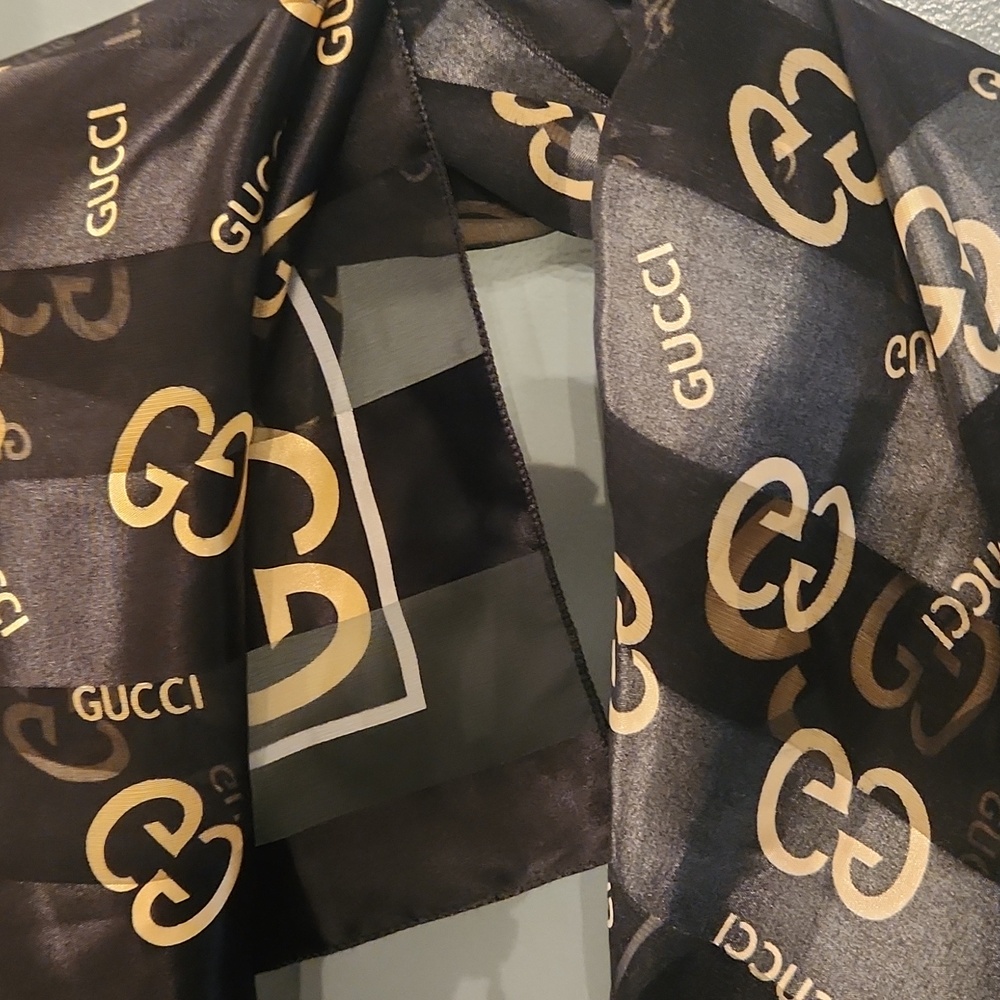 Gucci | Other | Gucci Black And Gold Logo Scarf | Poshmark
